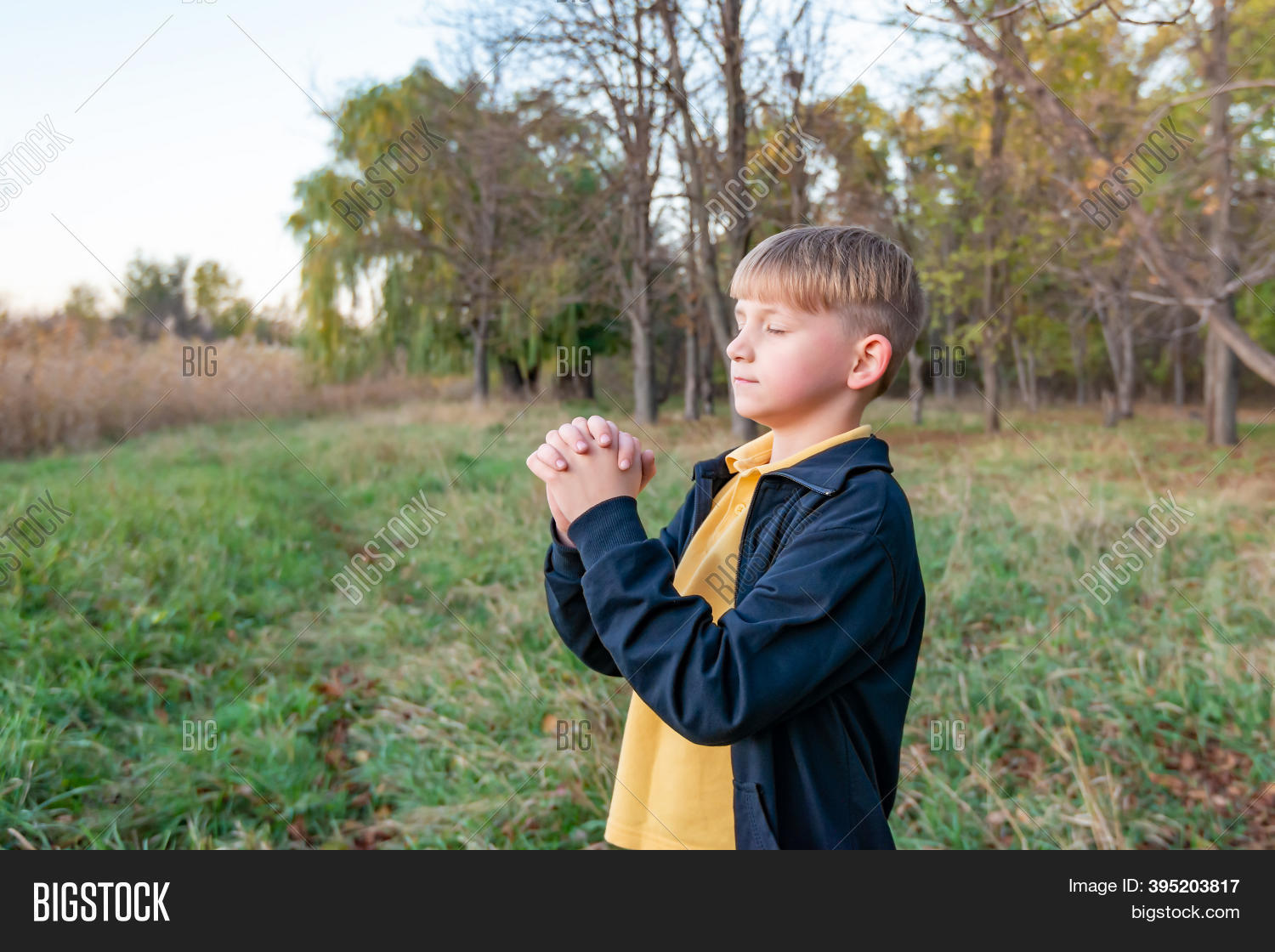 Boy Clasped His Hands Image & Photo (Free Trial) | Bigstock