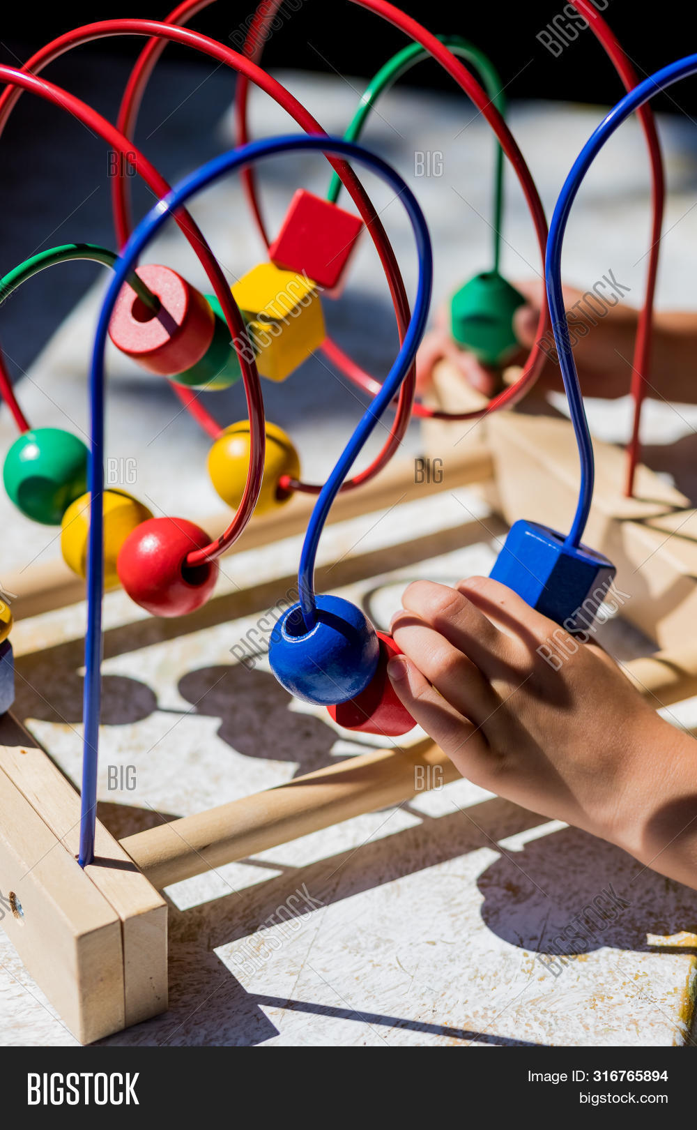 Child Playing Bead Image & Photo (Free Trial) | Bigstock