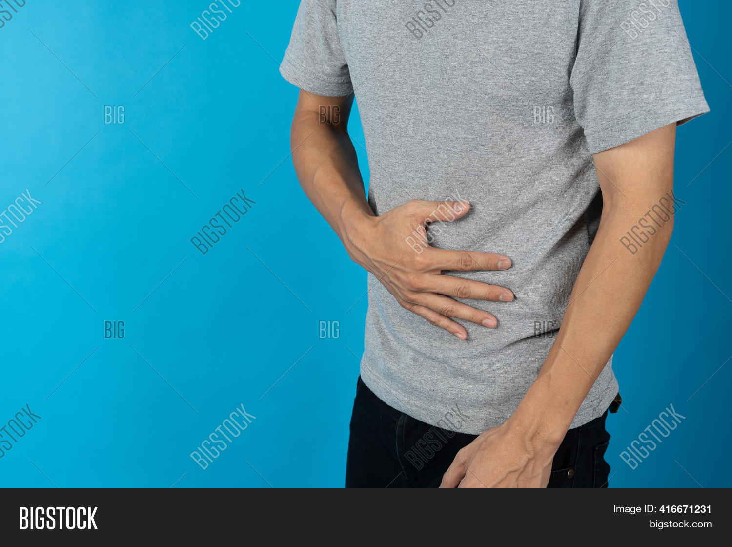 Hand Touch Stomach Has Image & Photo (Free Trial) | Bigstock