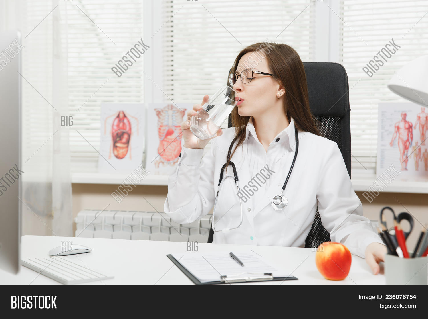 Female Doctor Sitting Image & Photo (Free Trial) | Bigstock