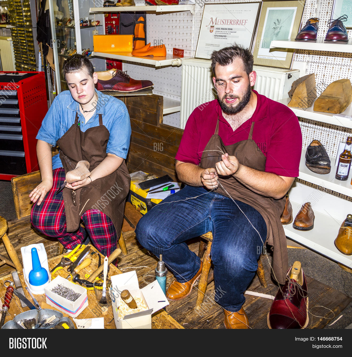 Shoemaker Opens His Image & Photo (Free Trial) | Bigstock