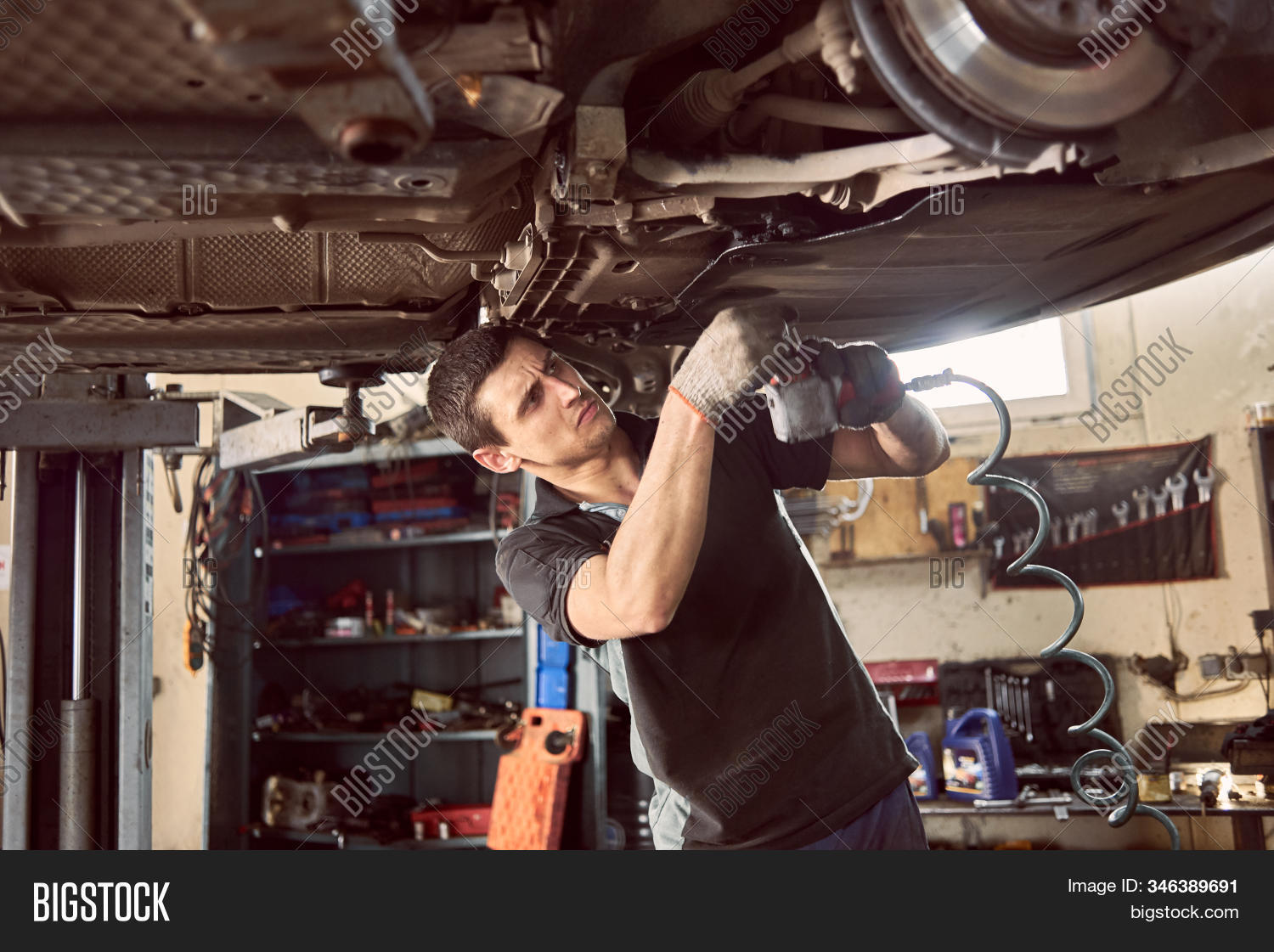 Repairman Fixing Car Image & Photo (Free Trial) | Bigstock