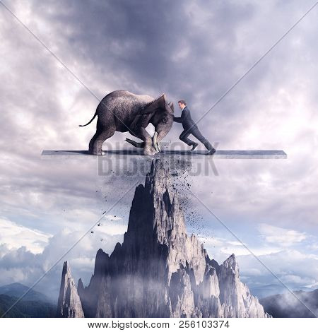 Man Elephant Pushing Image & Photo (Free Trial) | Bigstock