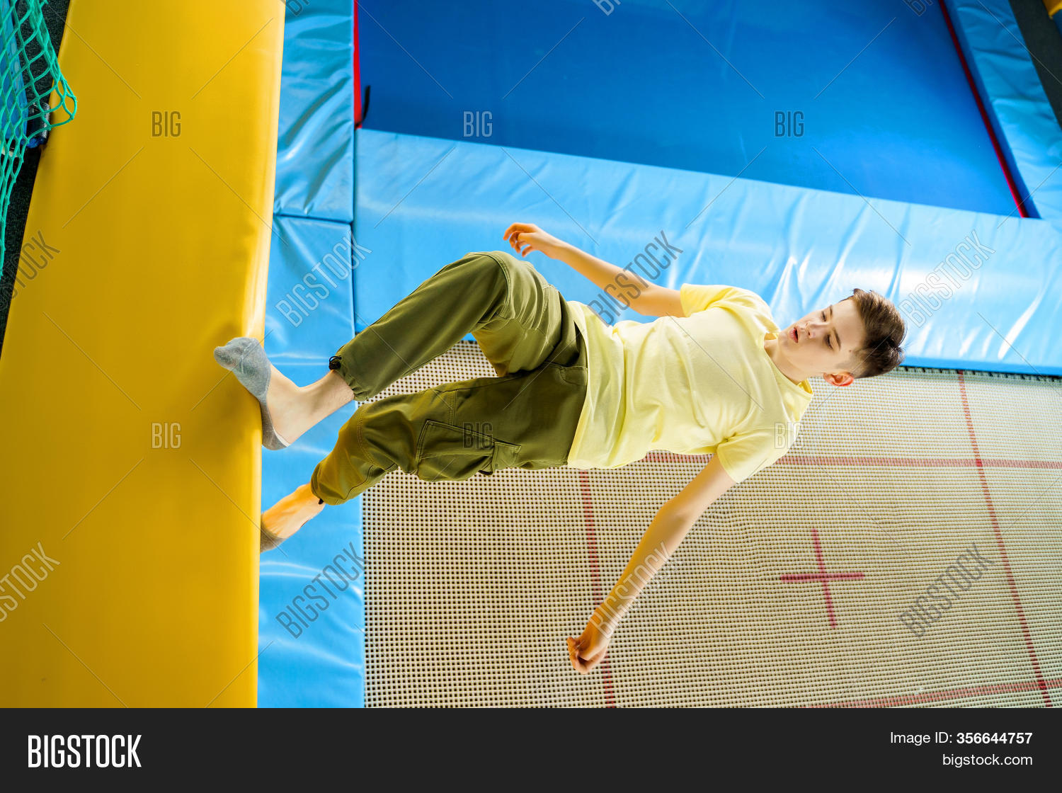 Teenage Boy Jumping On Image & Photo (Free Trial) | Bigstock