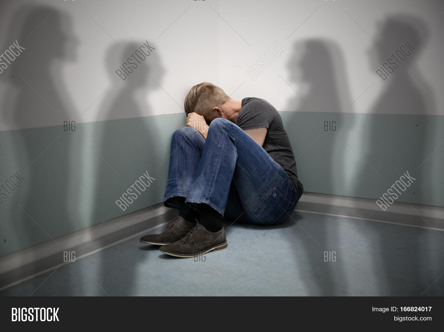 Man Cowering In Fear