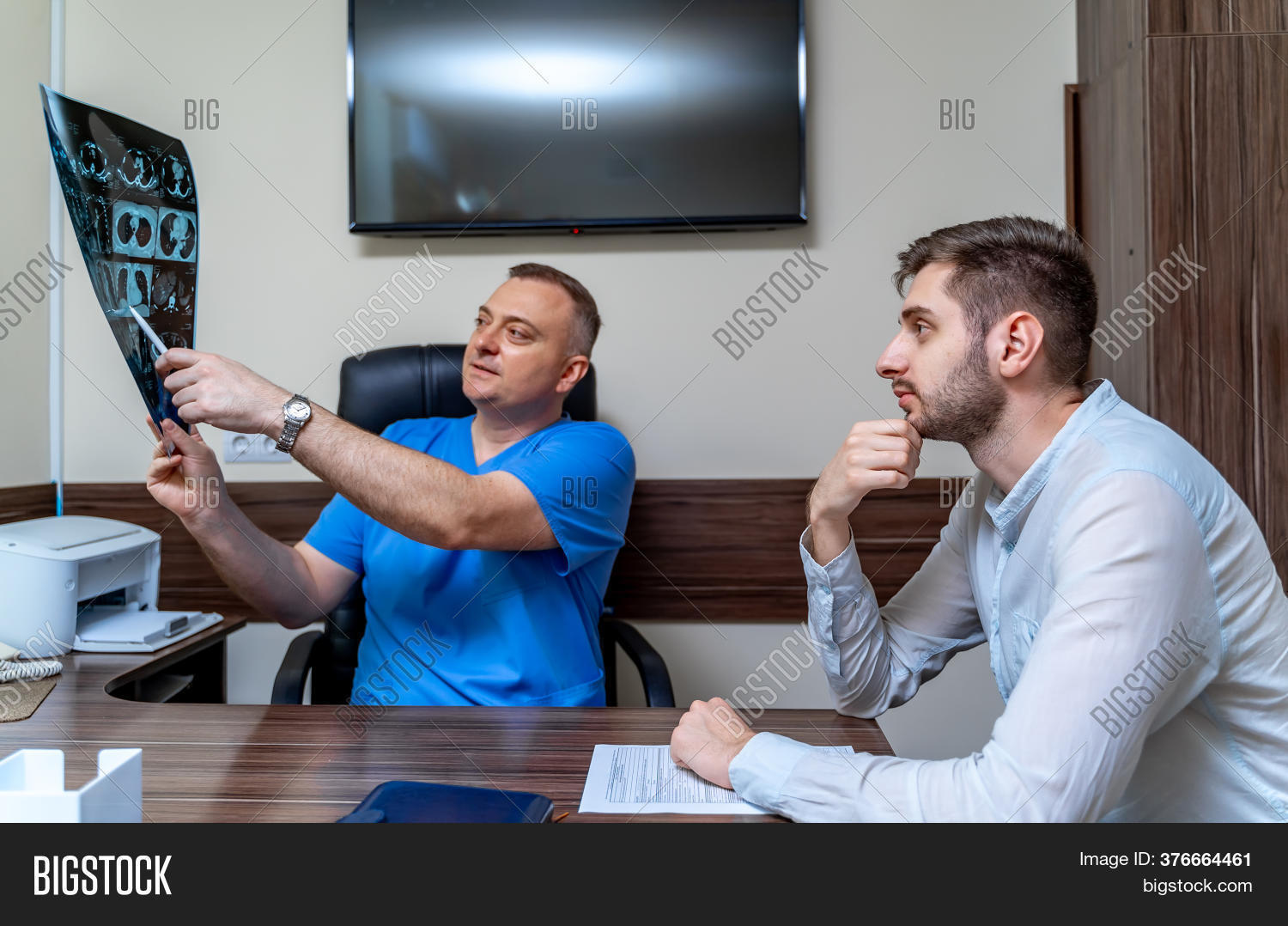 Doctor Explaining X- Image & Photo (Free Trial) | Bigstock