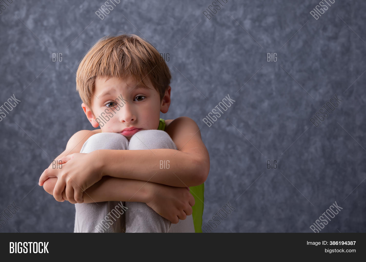 Sad Child Sits Hugging Image & Photo (Free Trial) | Bigstock