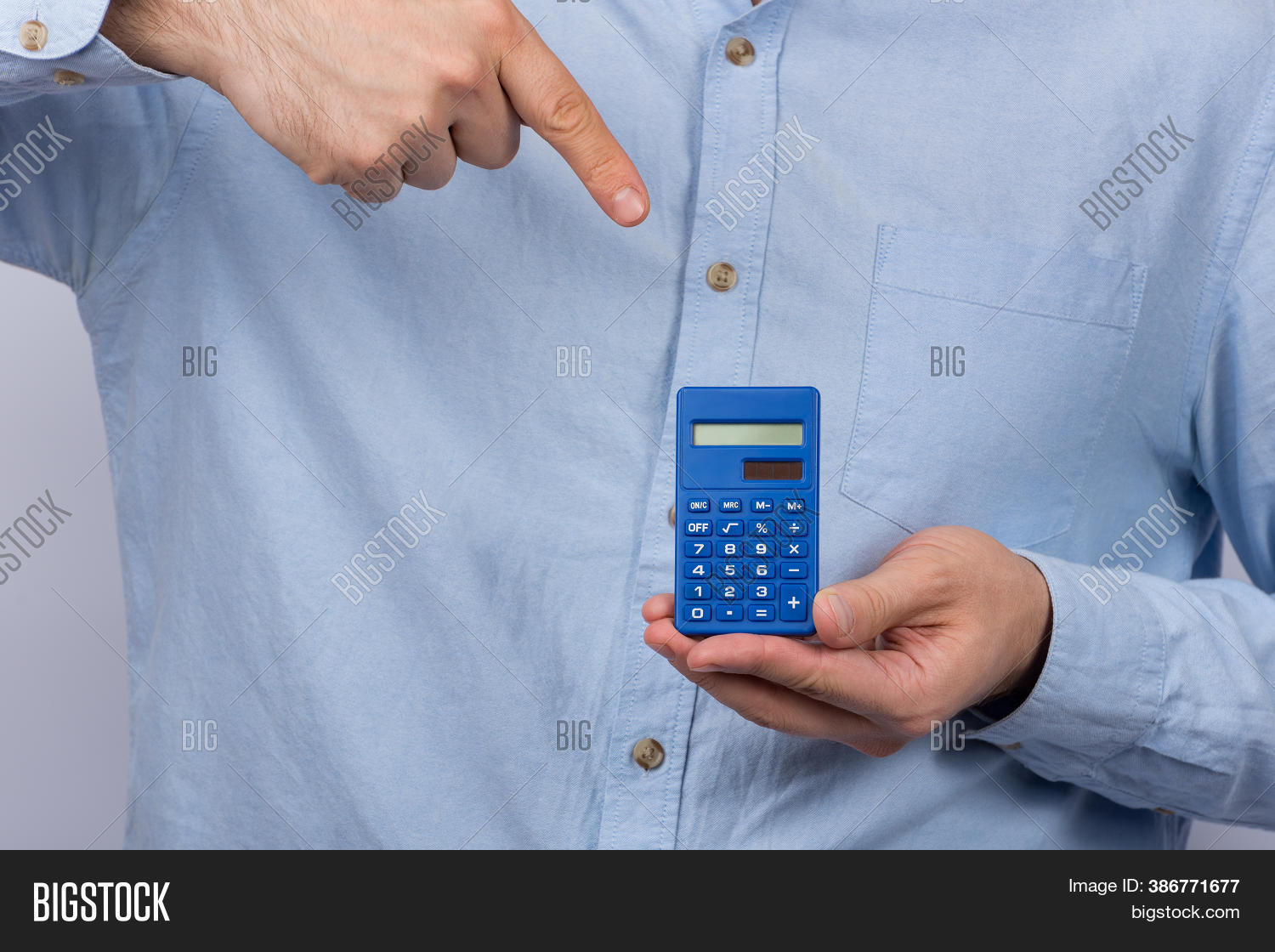 Man Holding Calculator Image & Photo (Free Trial) | Bigstock