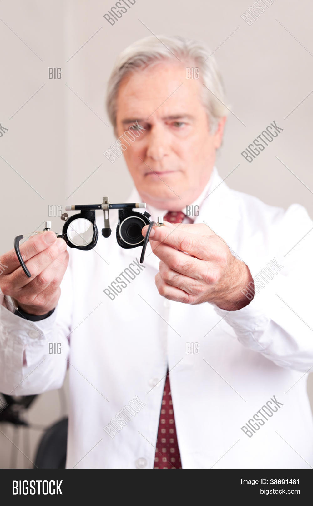 Optometrist Holding Image & Photo (Free Trial) | Bigstock