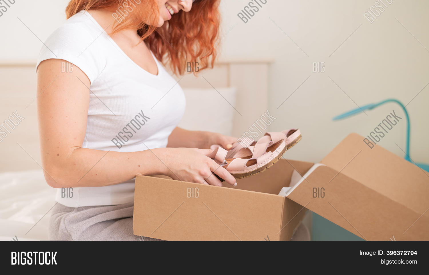 Happy Woman Unpacks Image & Photo (Free Trial) | Bigstock