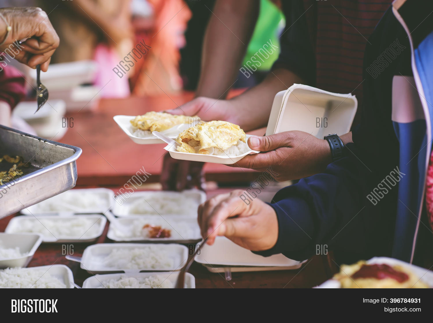 Volunteers Giving Food Image & Photo (Free Trial) | Bigstock
