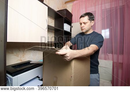 Man Takes Boxes Off Image & Photo (Free Trial) | Bigstock