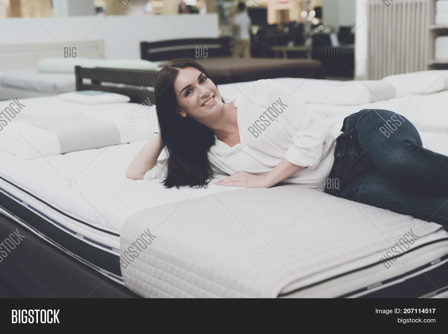 Woman Chooses Mattress Image & Photo (Free Trial) | Bigstock