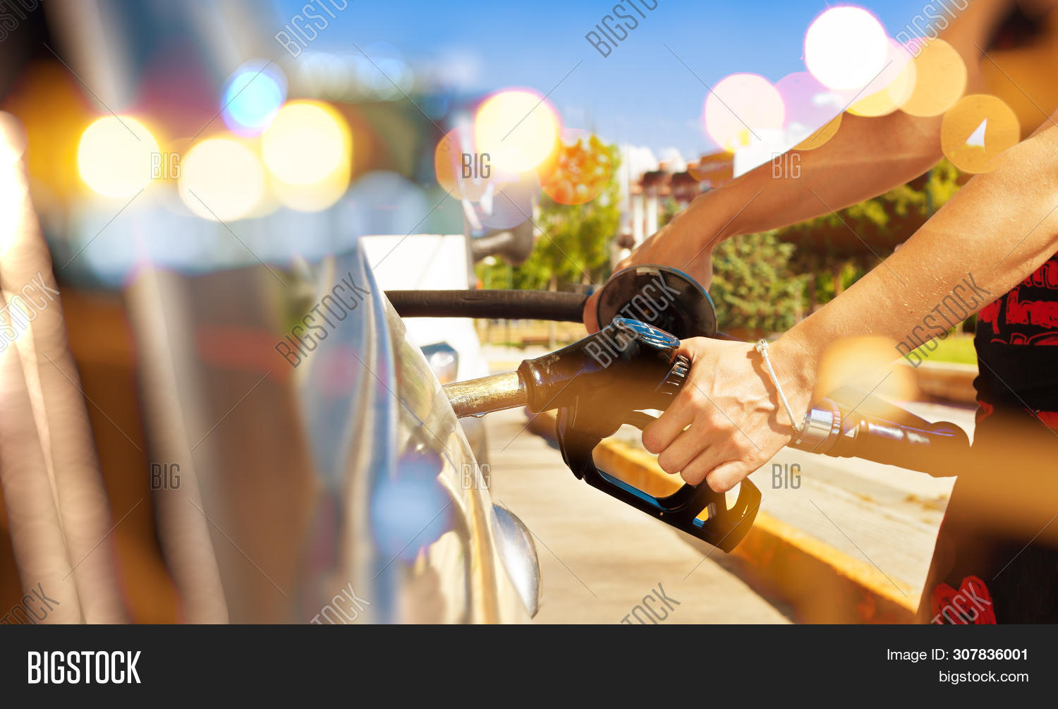 Woman Pouring Gasoline Image & Photo (Free Trial) | Bigstock