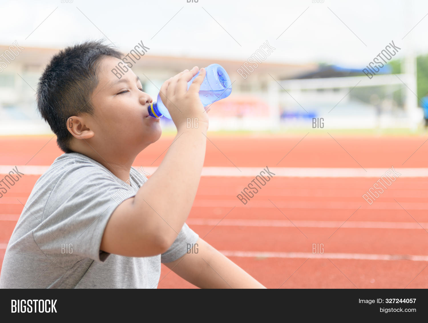 Fat Asian Boy Drink Image & Photo (Free Trial) | Bigstock