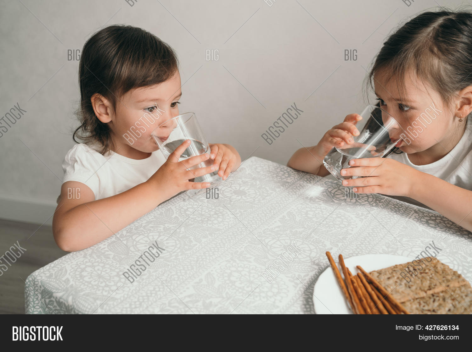 Young Children Drink Image & Photo (Free Trial) | Bigstock