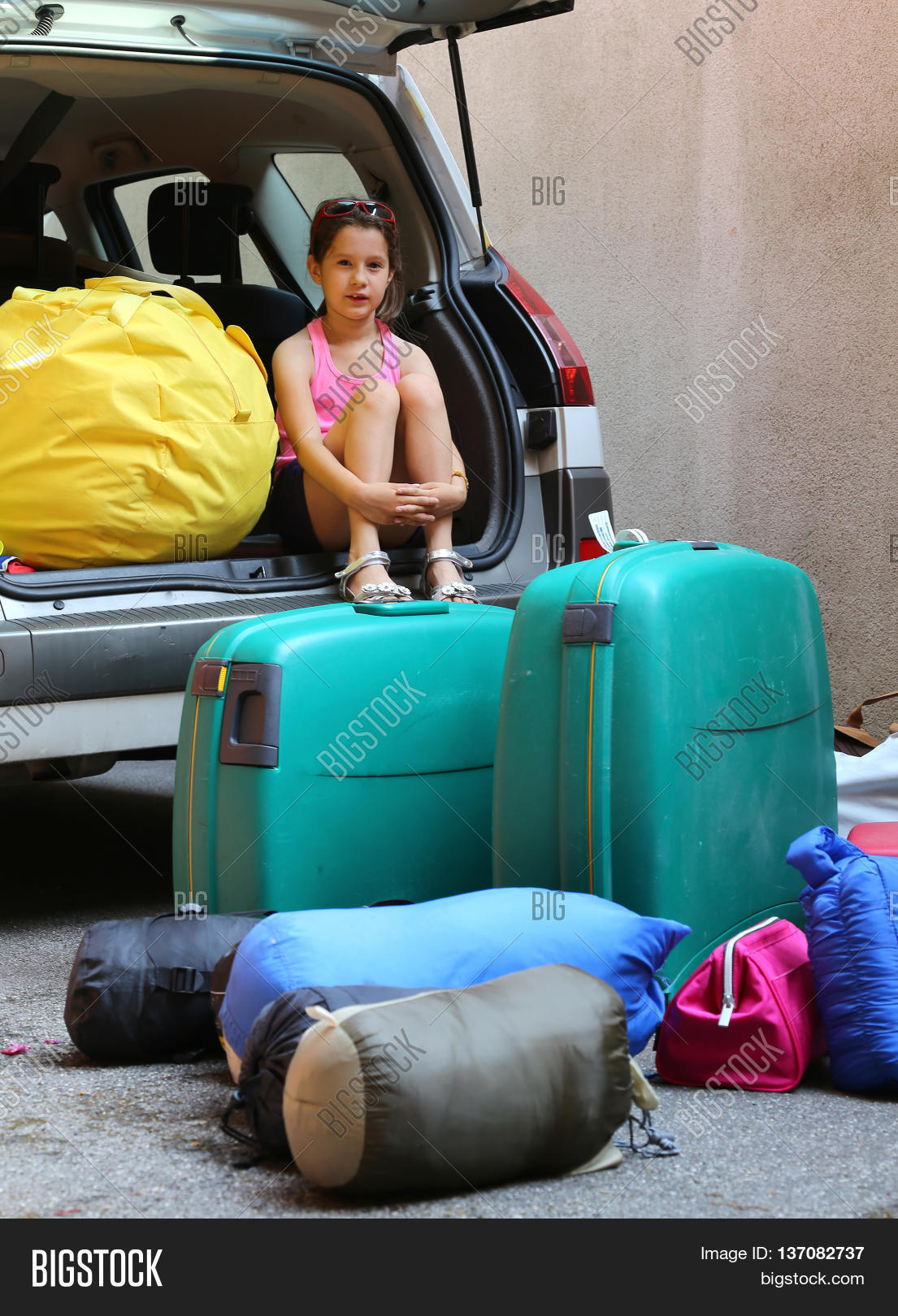 Little Girl Loads Car Image & Photo (Free Trial) | Bigstock