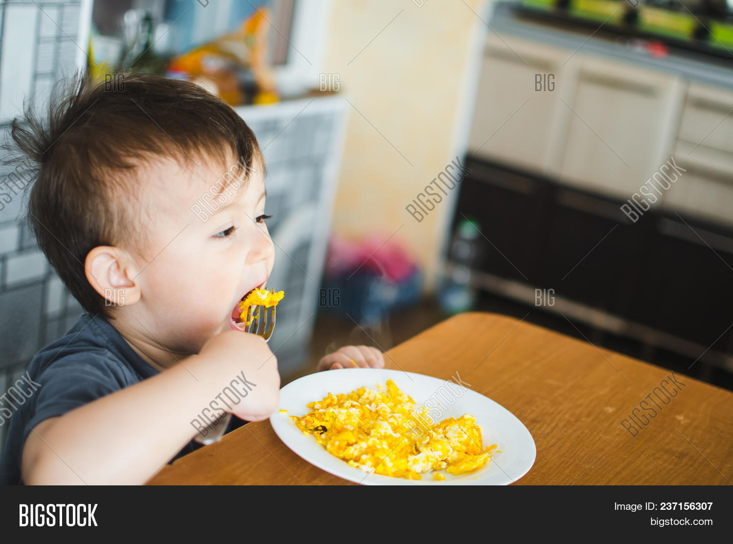 Child T-shirt Kitchen Image & Photo (Free Trial) | Bigstock