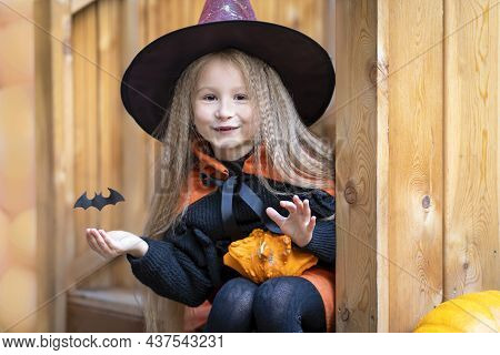 Happy Scary Halloween! Cute Little Witch With Candy Bucket, Pumpkins ...
