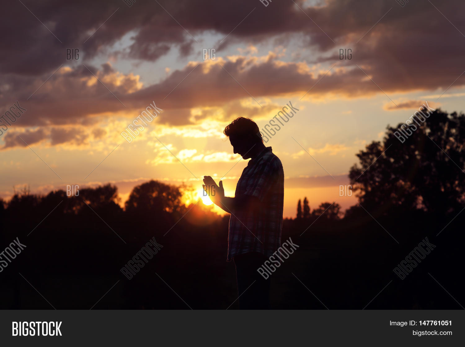 Man Praising Silhouette
