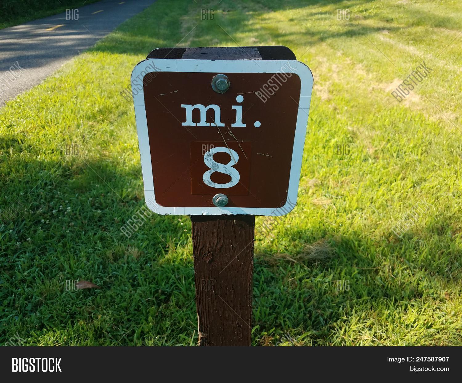 Brown 8 Mile Sign Mile Image & Photo (Free Trial) | Bigstock