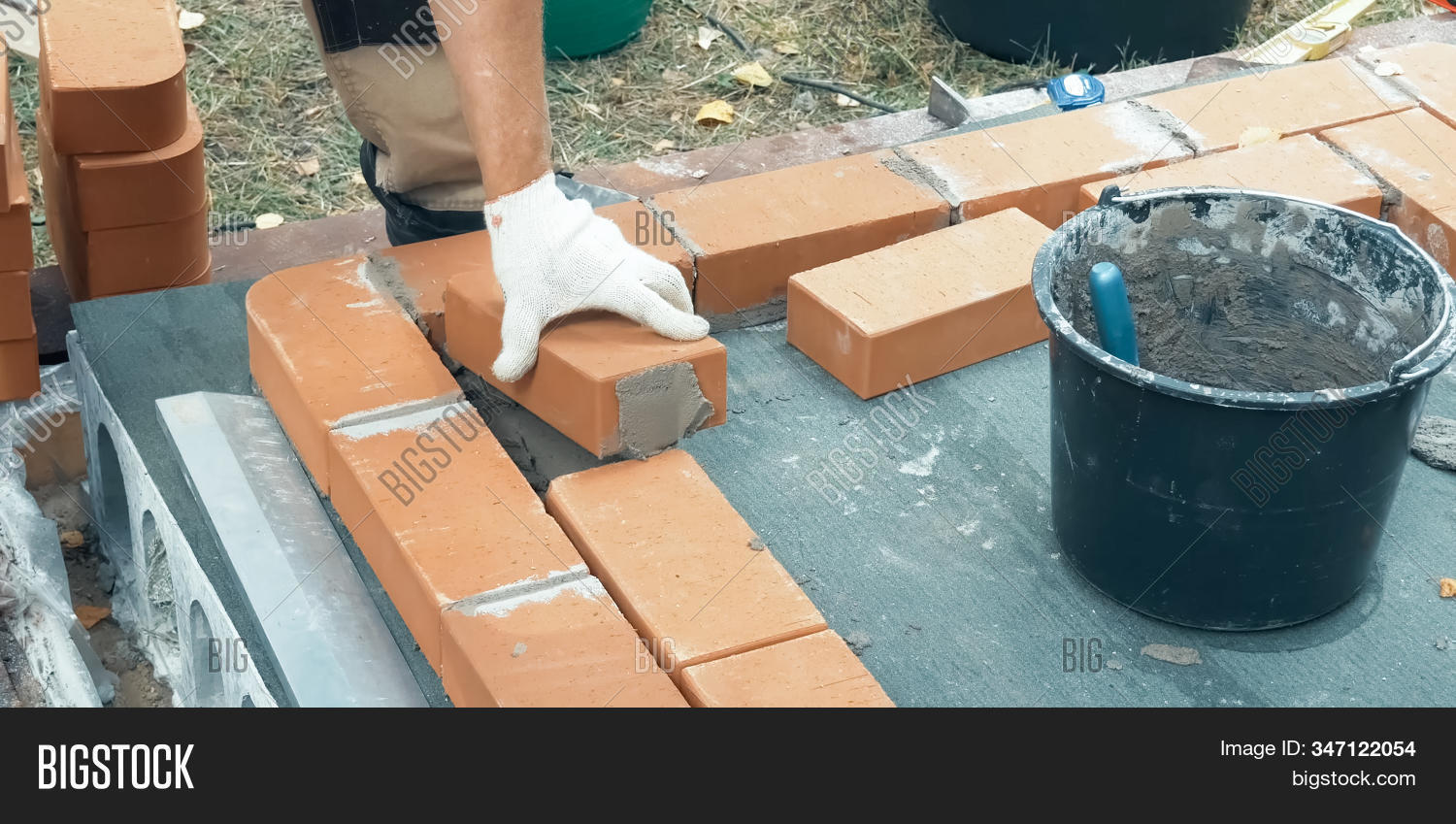 Man Builds Brick Wall Image & Photo (Free Trial) | Bigstock