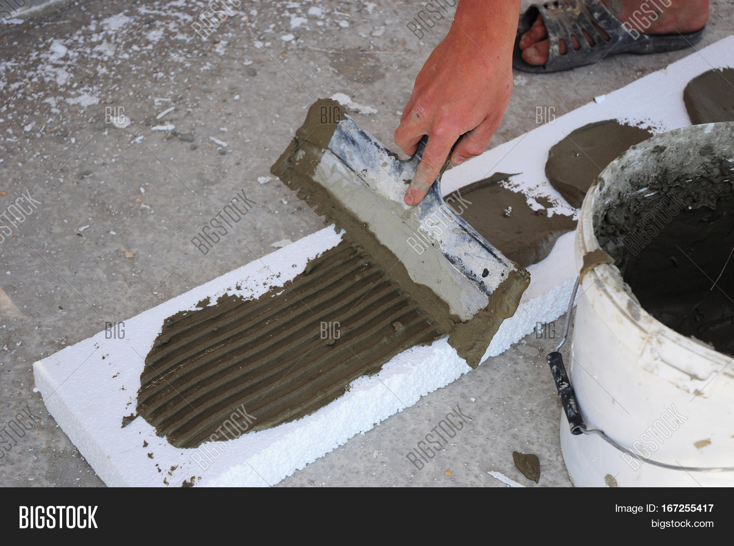 Man's Hand Plastering Image & Photo (Free Trial) | Bigstock