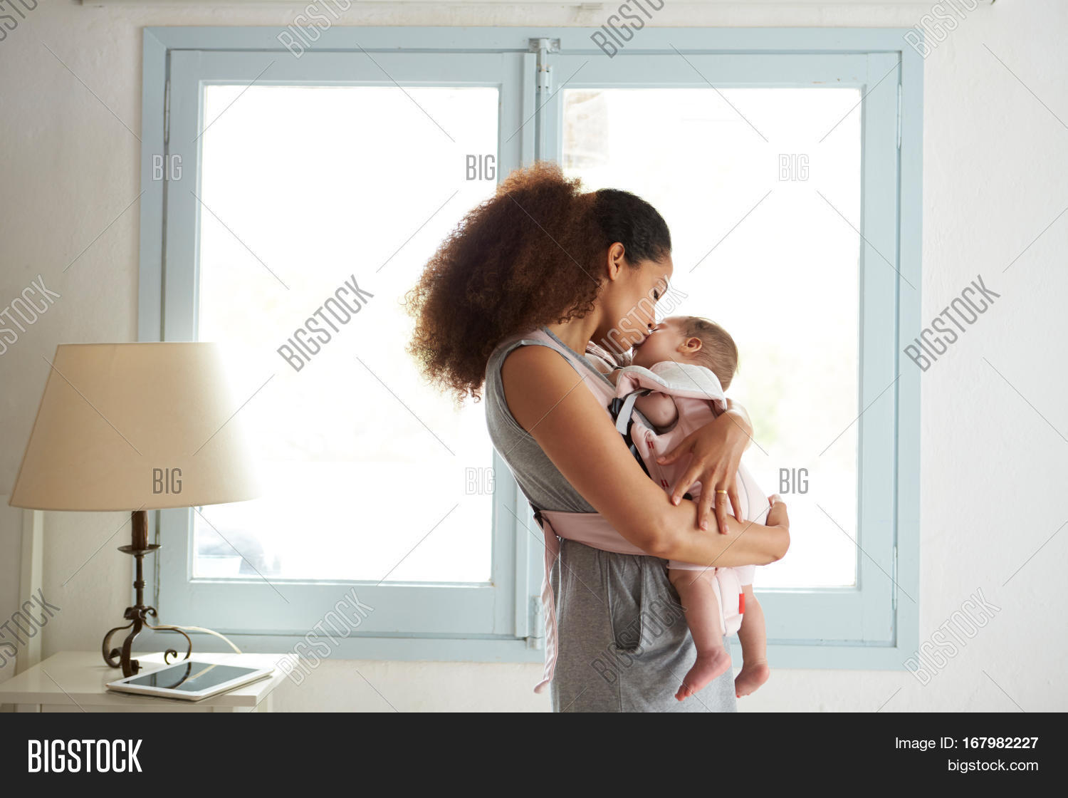 Mother Cuddling Baby Image & Photo (Free Trial) | Bigstock