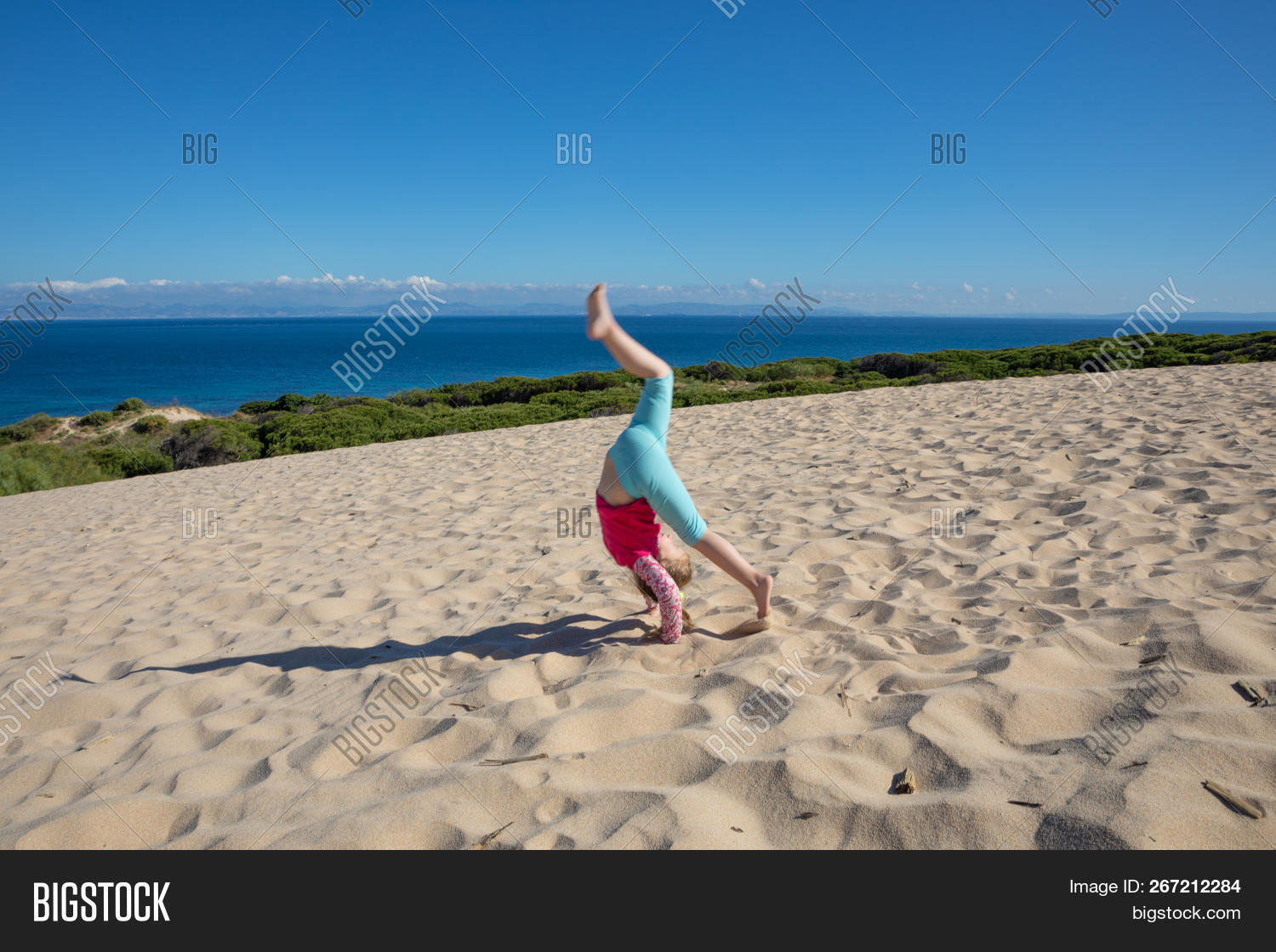 Girl Doing Somersault Image & Photo (Free Trial) | Bigstock