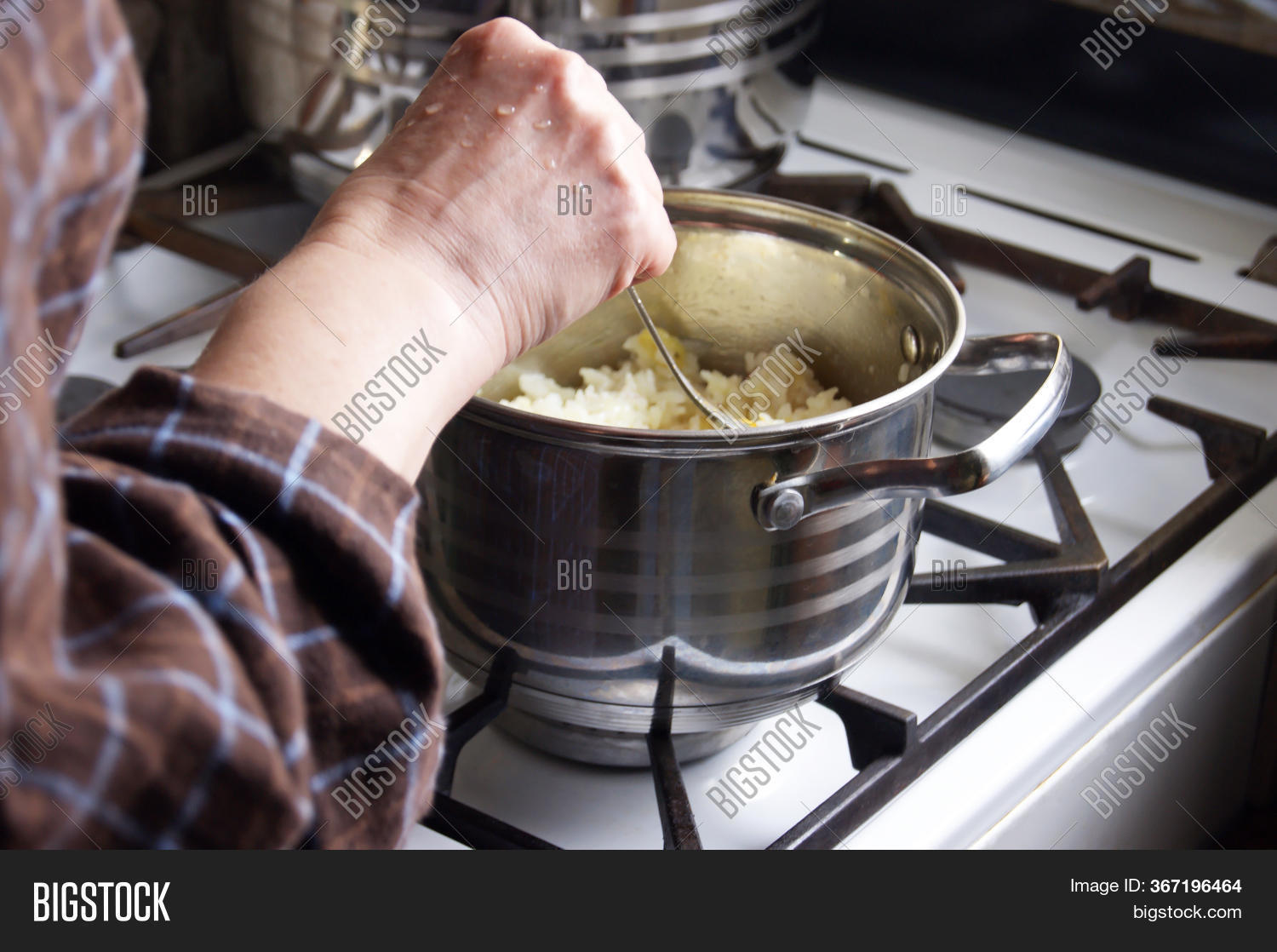 Woman Standing Stove. Image & Photo (Free Trial) | Bigstock