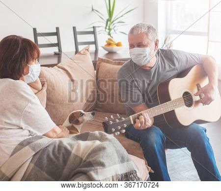 Coronavirus CoVid-19 Couple old aged senior people at home with ...