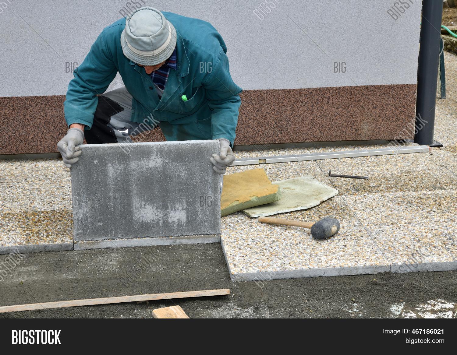 Paver On Knee Lays Image & Photo (Free Trial) | Bigstock