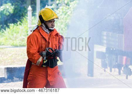 Fire Man Spray Water Image & Photo (Free Trial) | Bigstock
