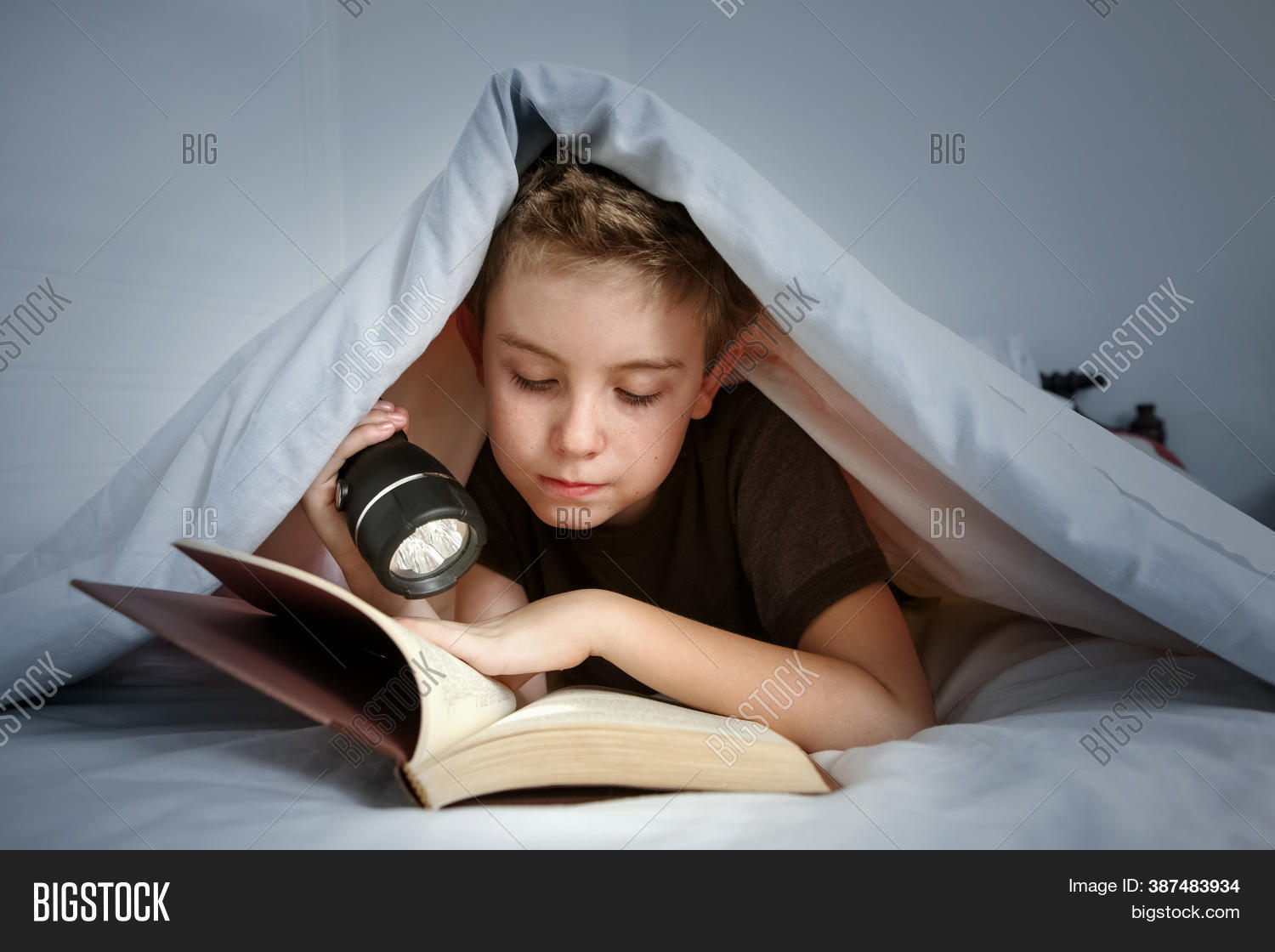 Boy Reading Under Image & Photo (Free Trial) | Bigstock