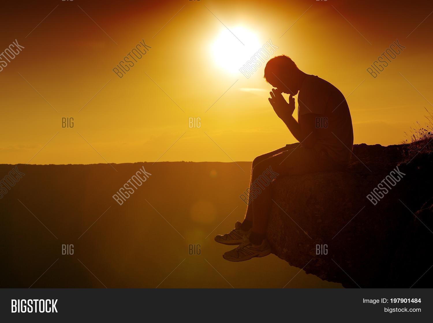 Young Man Sunset Pray Image & Photo (Free Trial) | Bigstock