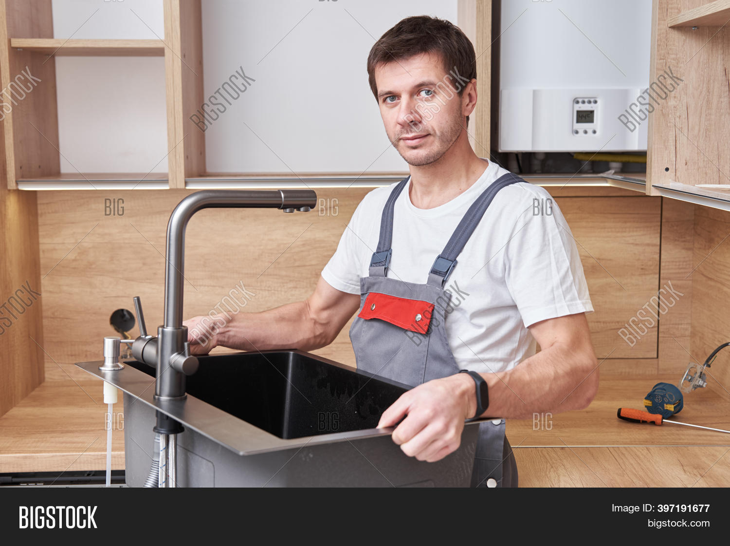 Male Plumber Installs Image & Photo (Free Trial) | Bigstock