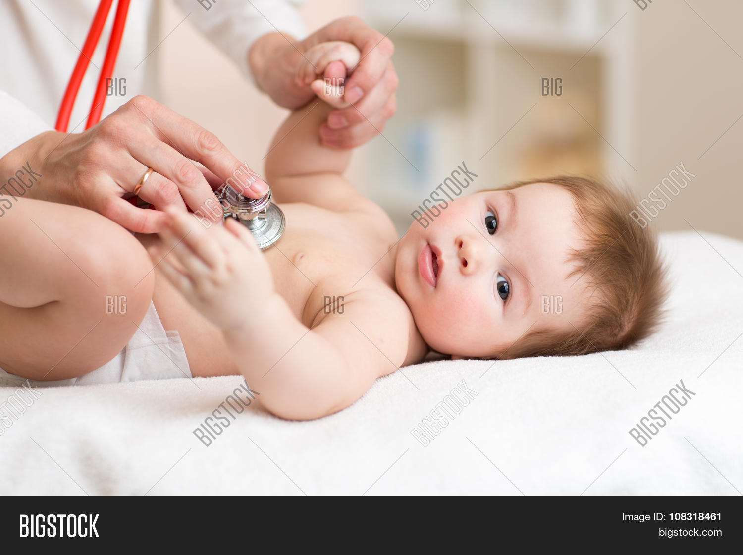 Pediatrician Examining Image & Photo (Free Trial) | Bigstock