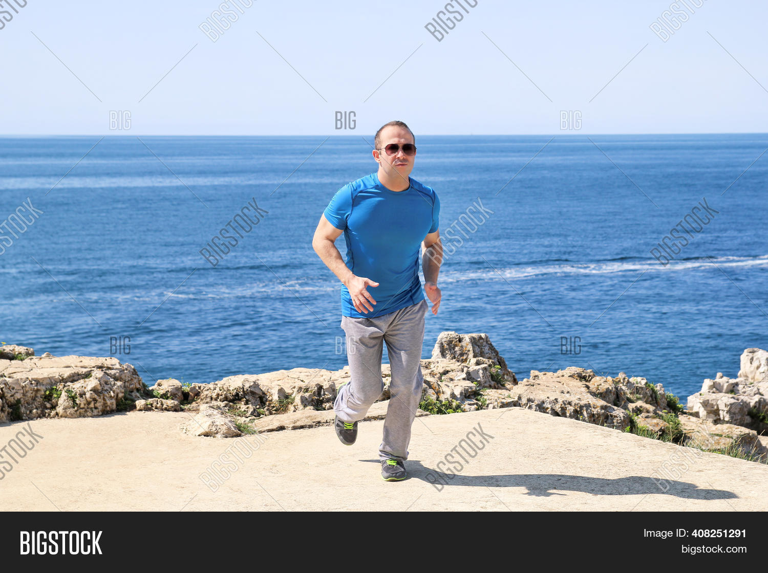 Fit Young Man Jogging Image & Photo (Free Trial) | Bigstock