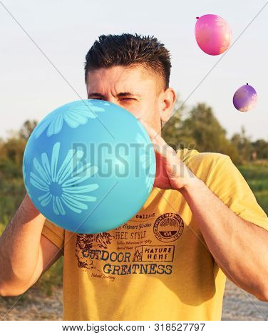 Man Inflates Blue Image & Photo (Free Trial) | Bigstock