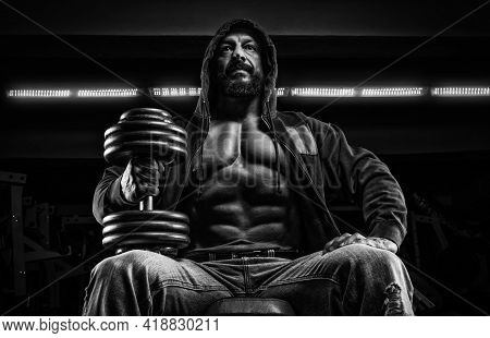 Muscular Man Sits On Image & Photo (Free Trial) | Bigstock