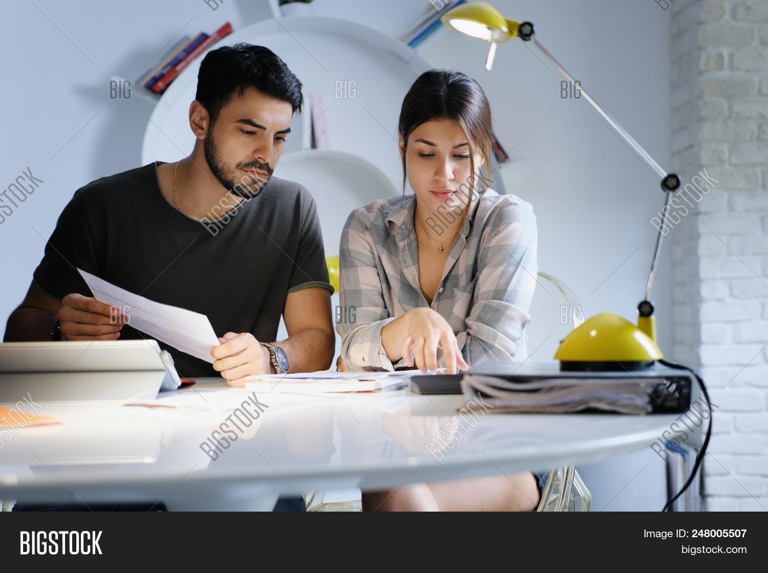 Young Couple Reviewing Image & Photo (Free Trial) | Bigstock