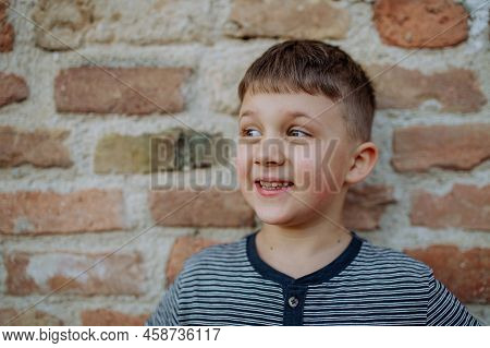Little Boy Standing By Image & Photo (Free Trial) | Bigstock