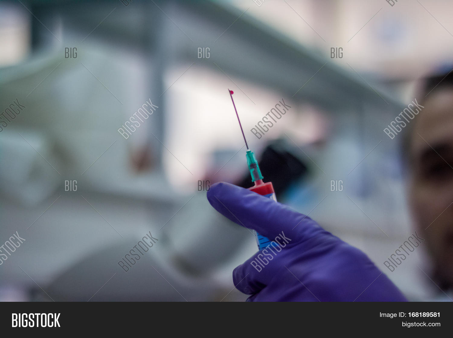 Doctor Holding Needle Image & Photo (Free Trial) | Bigstock