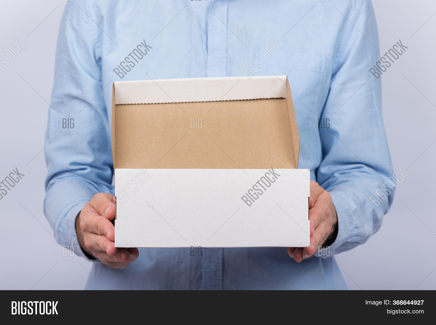 Man Holding Cardboard Image & Photo (Free Trial) | Bigstock