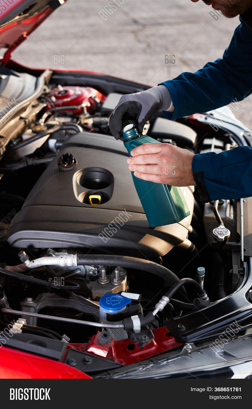 Checking Refilling Oil Image & Photo (Free Trial) | Bigstock