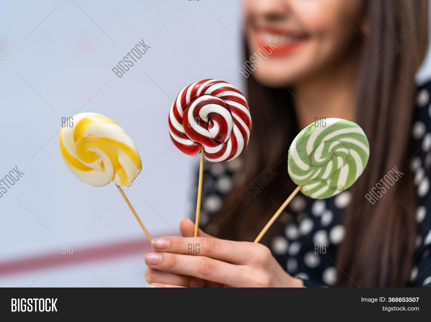 Hand Holding Lollipops Image & Photo (Free Trial) | Bigstock