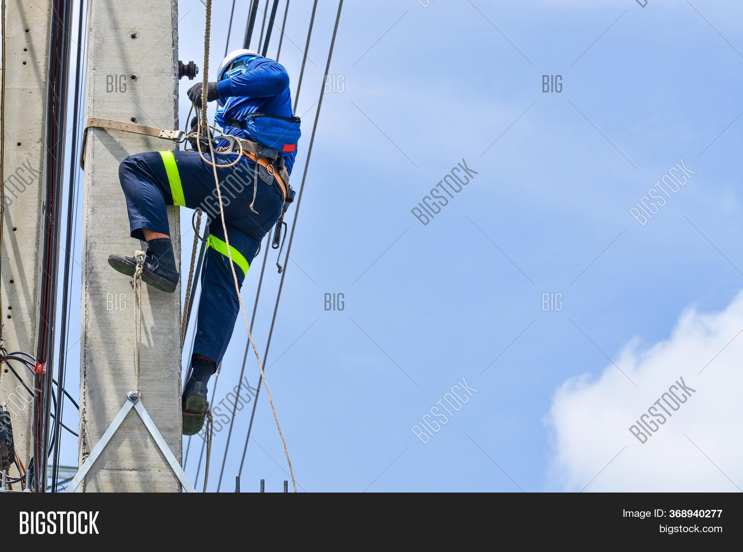 Electricians Climbing Image & Photo (Free Trial) | Bigstock
