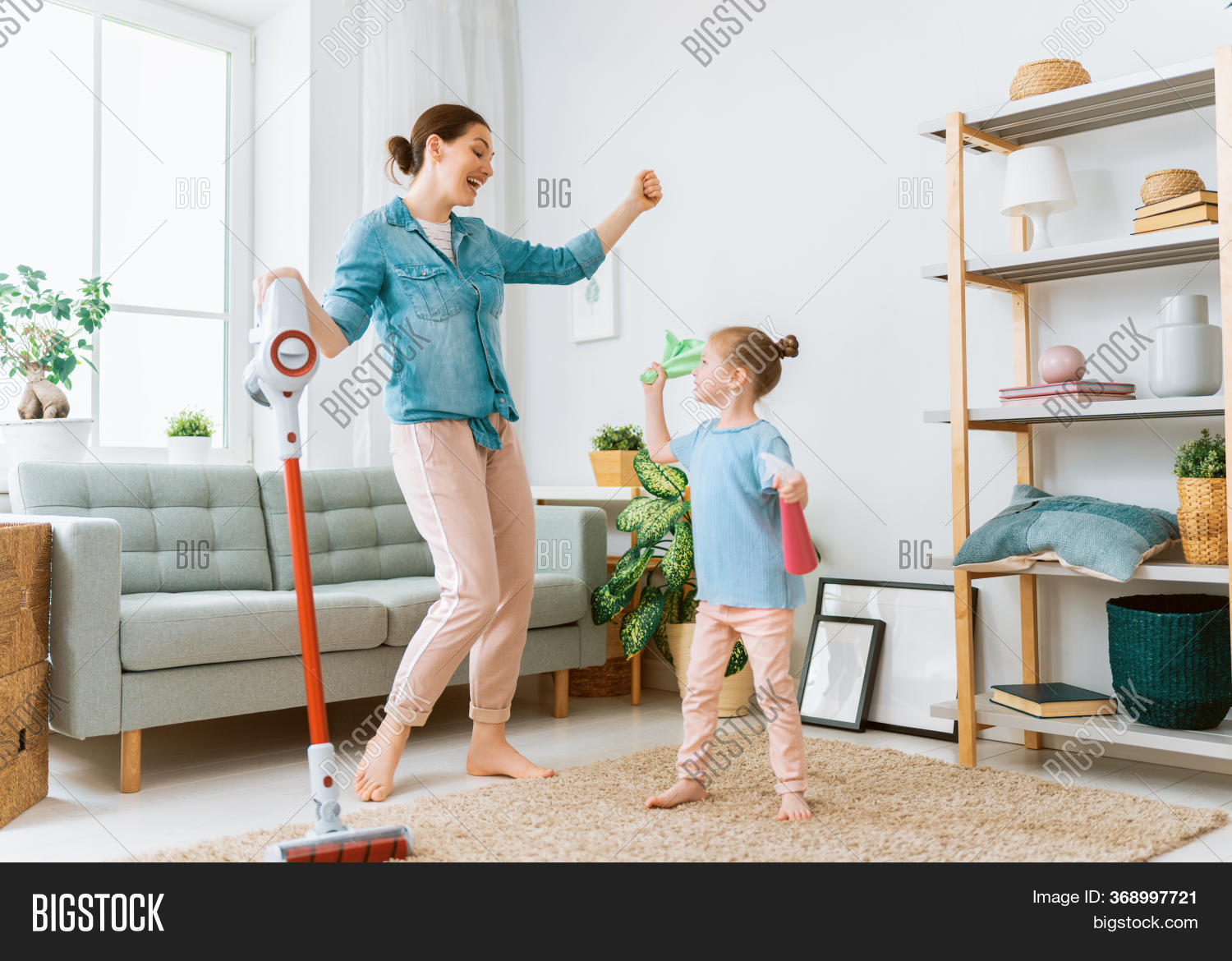 Happy Family Vacuuming Image & Photo (Free Trial) | Bigstock