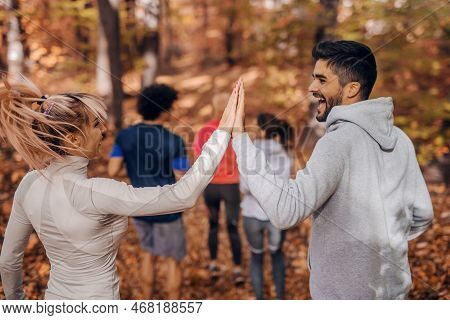 Runners Giving High Image & Photo (Free Trial) | Bigstock