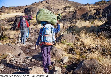 Porter Carrying Heavy Image & Photo (Free Trial) | Bigstock